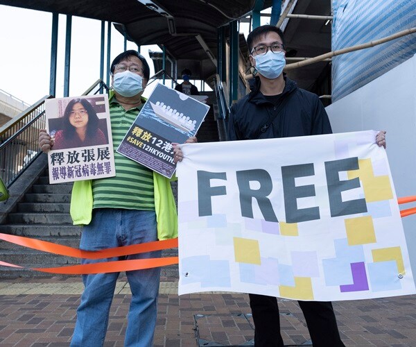 UPDATE 2-China Jails Citizen-journalist for Four Years over Wuhan Virus ...