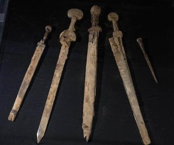 4 Exceptionally Preserved Roman Swords Discovered in a Dead Sea Cave in ...