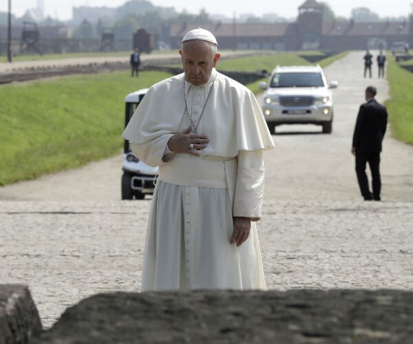 Pope Visits Auschwitz in Silence, Meets Survivors | Newsmax.com