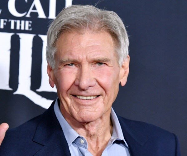 Harrison Ford Credits Jimmy Buffett for Ear Piercing | Newsmax.com