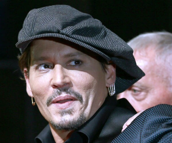 7 Ways Johnny Depp Burned Through $2 Million a Month? | Newsmax.com