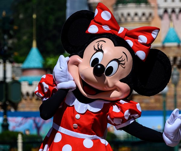 Minnie Mouse Switches Her Iconic Red Dress for a Pantsuit | Newsmax.com