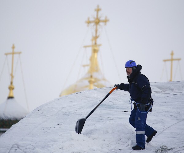 Russia Calls in Army After 'Snowfall of the Century' in Moscow ...