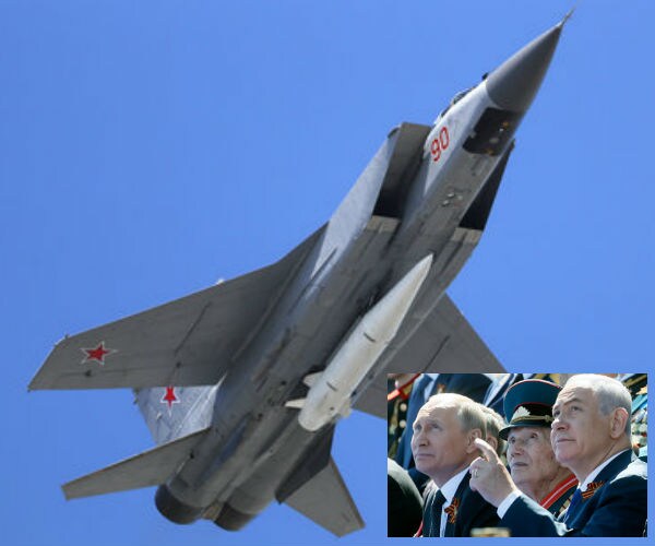 Putin Reviews Russia's 'Invincible Weapons' in Red Square March ...