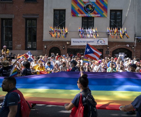 50 Years of LGBTQ Pride Showcased in Protests, Parades | Newsmax.com