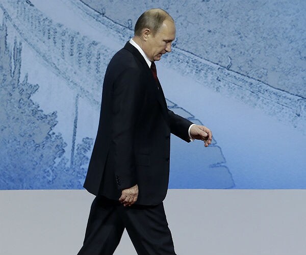 Why Vladimir Putin Walks Like a Gunslinger | Newsmax.com