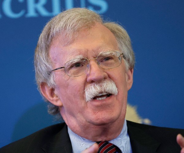 John Bolton: Biden Ready to Take Dems Over Cliff With Him | Newsmax.com