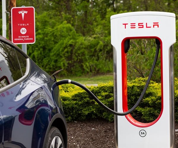 Tesla's Charging Layoffs to Slow Biden's Highway Plans | Newsmax.com